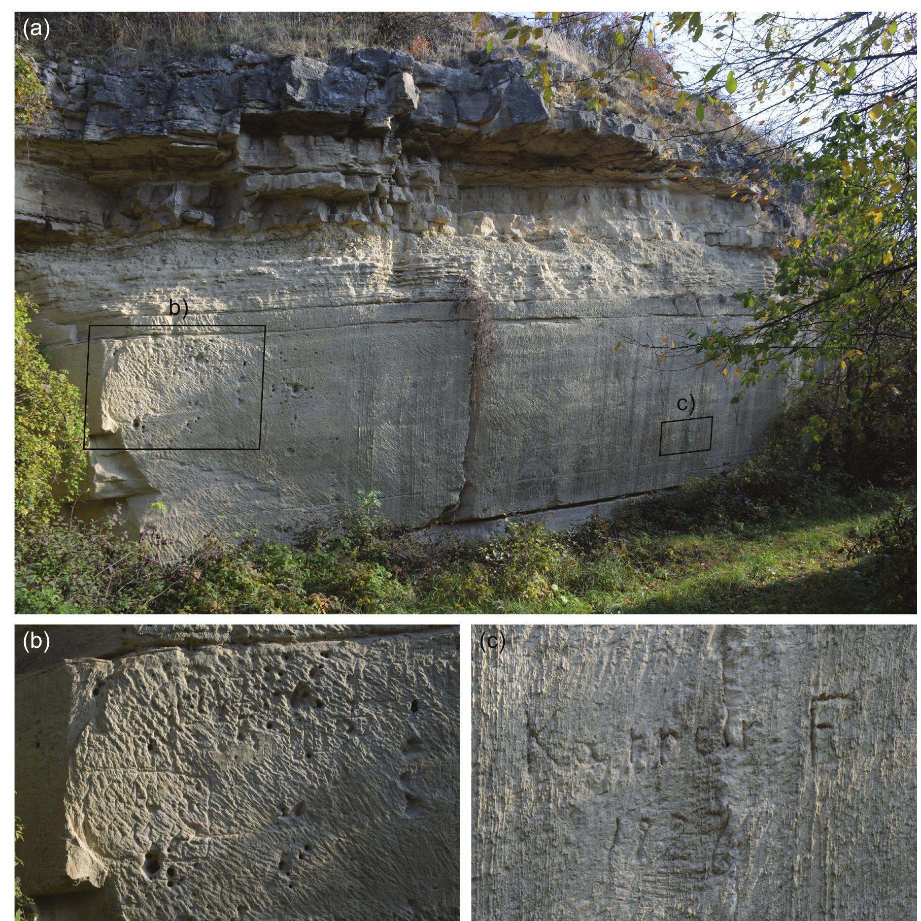 Quarry face with pick marks and graffiti from the large