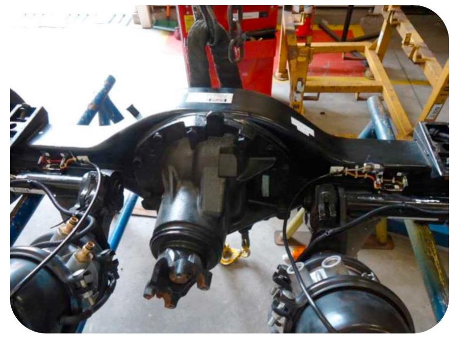 Brake chambers mounted on the rear axle of a heavy vehicle