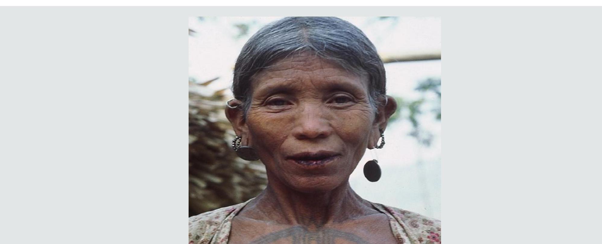 Wangcha, with black dyed teeth and mouth. photo credit