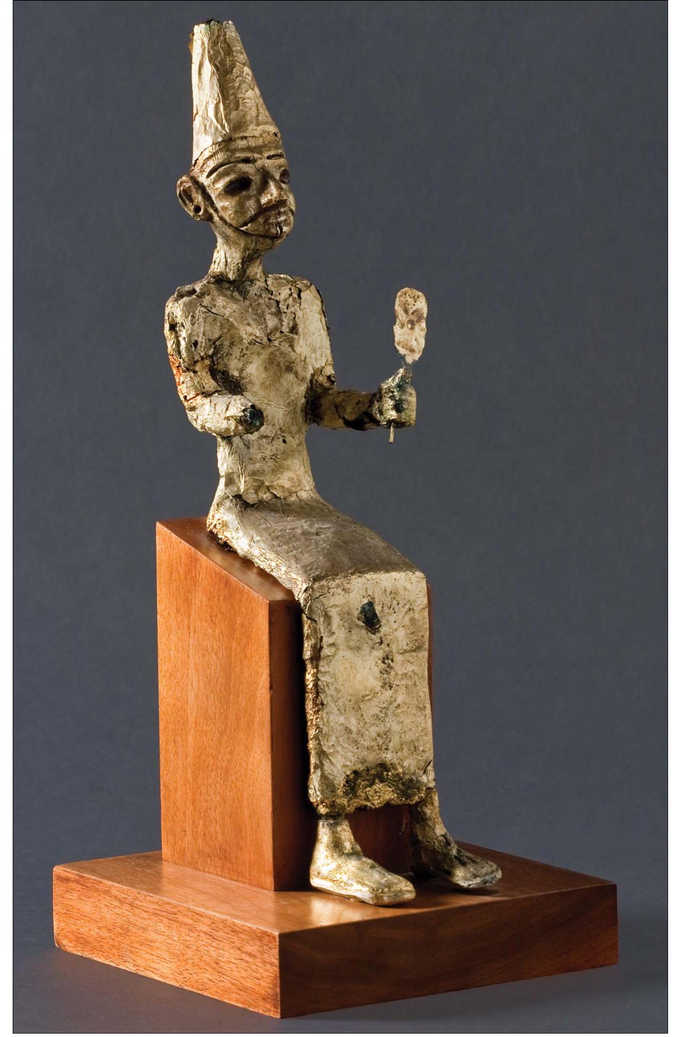 Canaanite figurine of a seated god from late bronze age