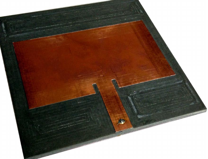 Photograph of a microstrip patch antenna element. the