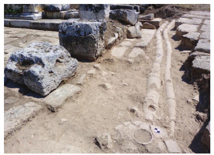 Early byzantine slab paving and terracotta pipes on the s