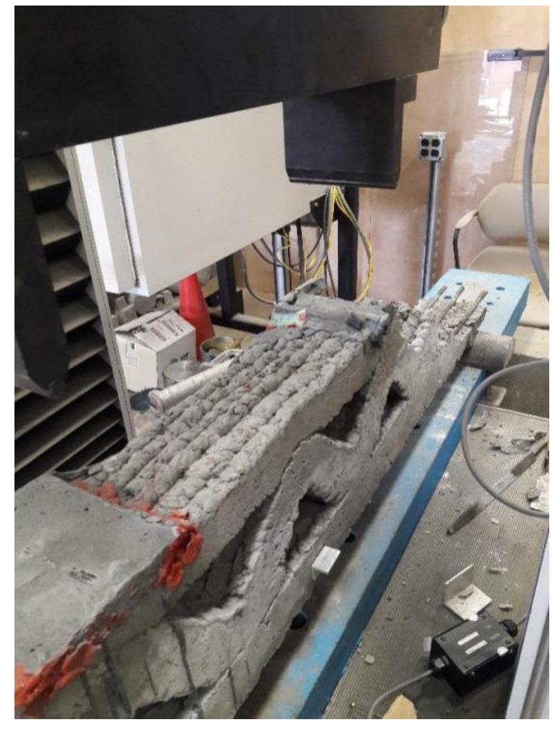 Failure of rebar-reinforced concrete shown in figure 24.