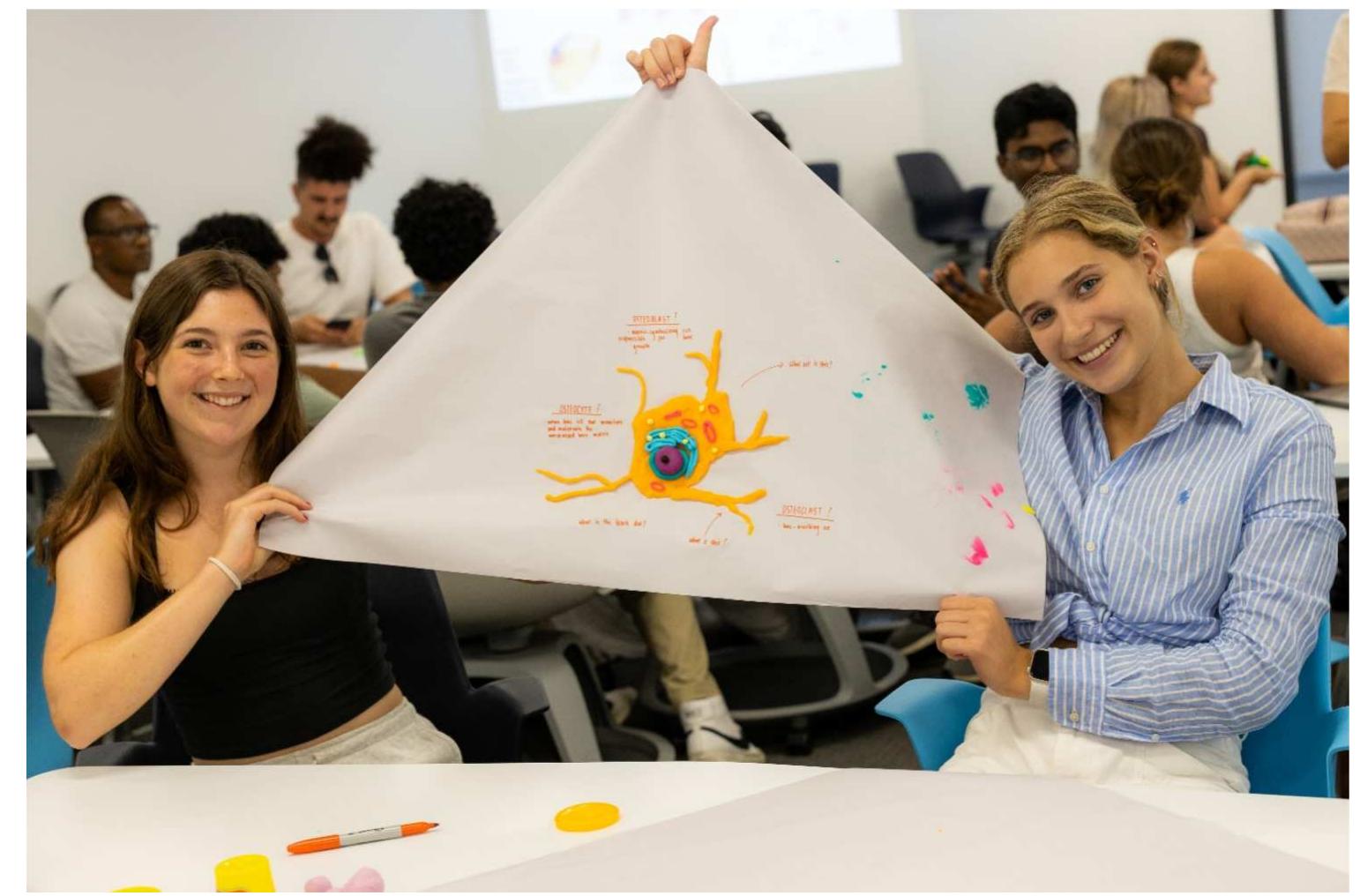 Students in a crafts session using a modelling compound to