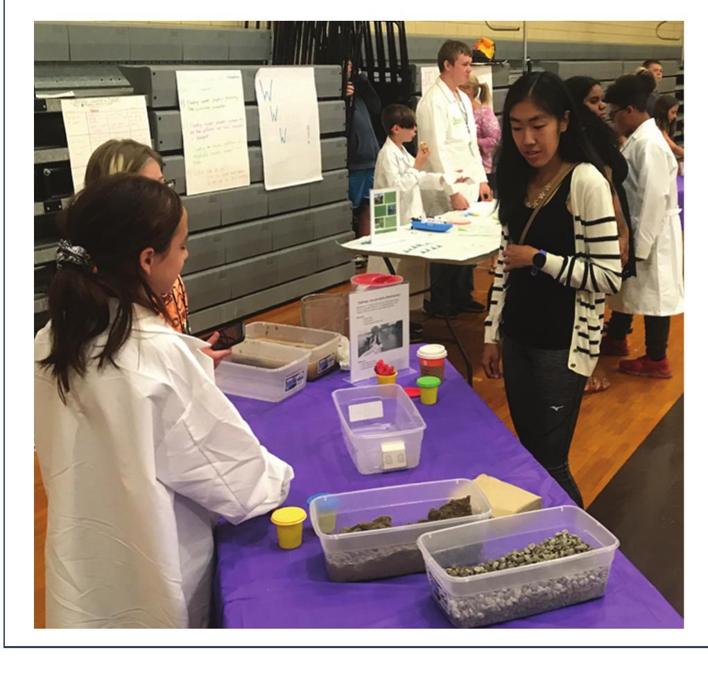 Campers from five different science lab teams presented