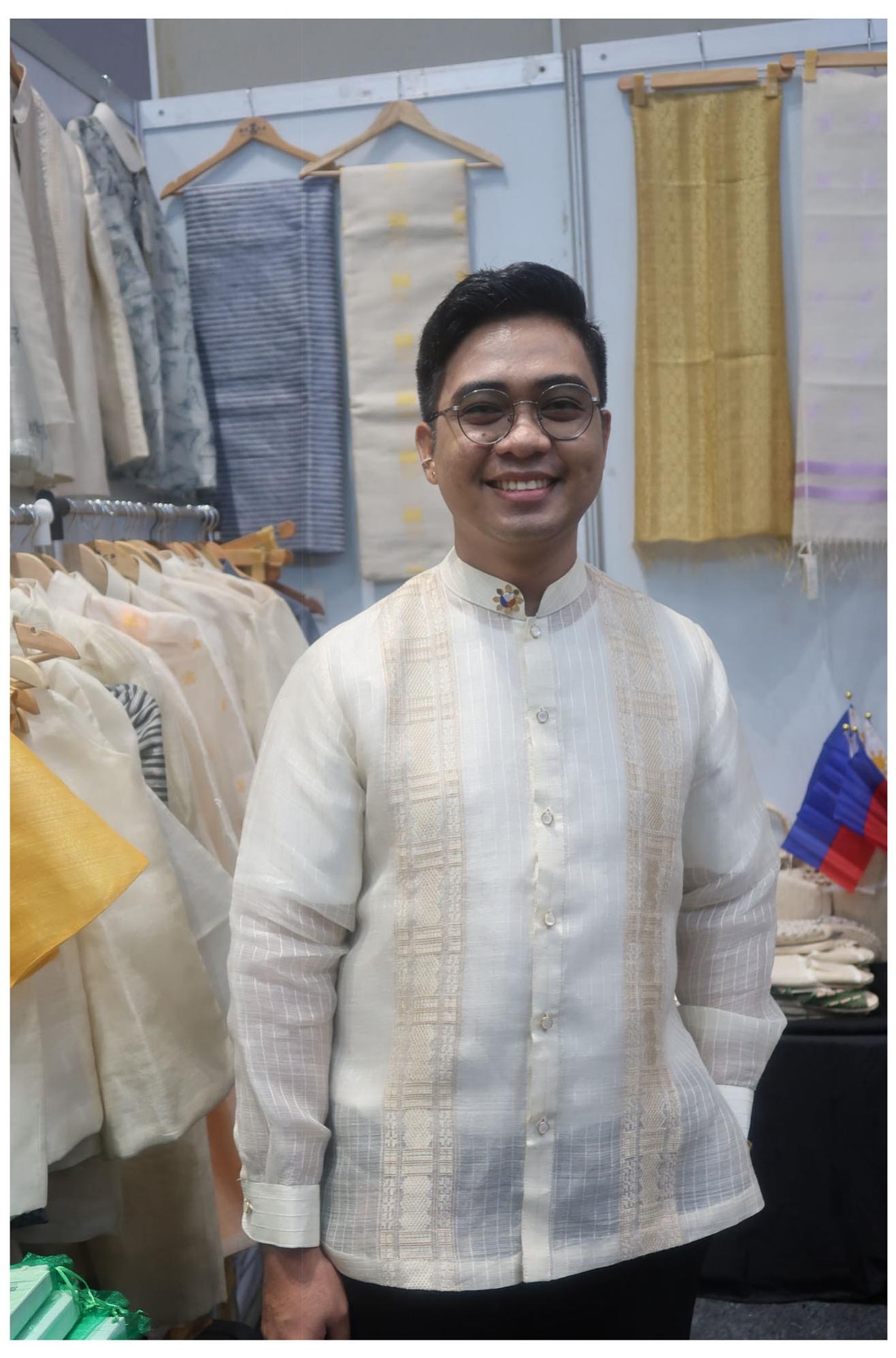 Carlo eliserio wearing a pina-seda barong tagalog with