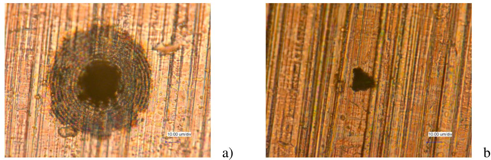 Optical microscope images of entrance (a) and exit (b) holes