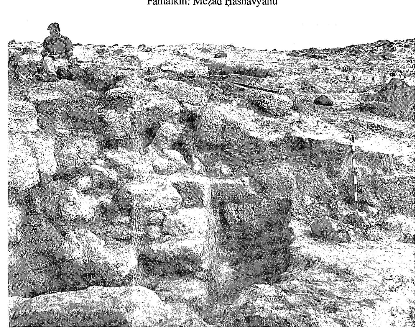 J. naveh recording finds during the excavations.