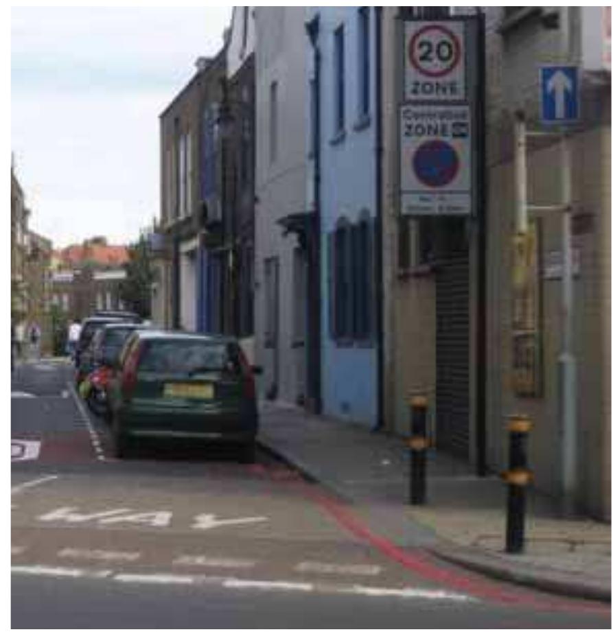 Controlled parking zone (cpz) signage at street entrance.