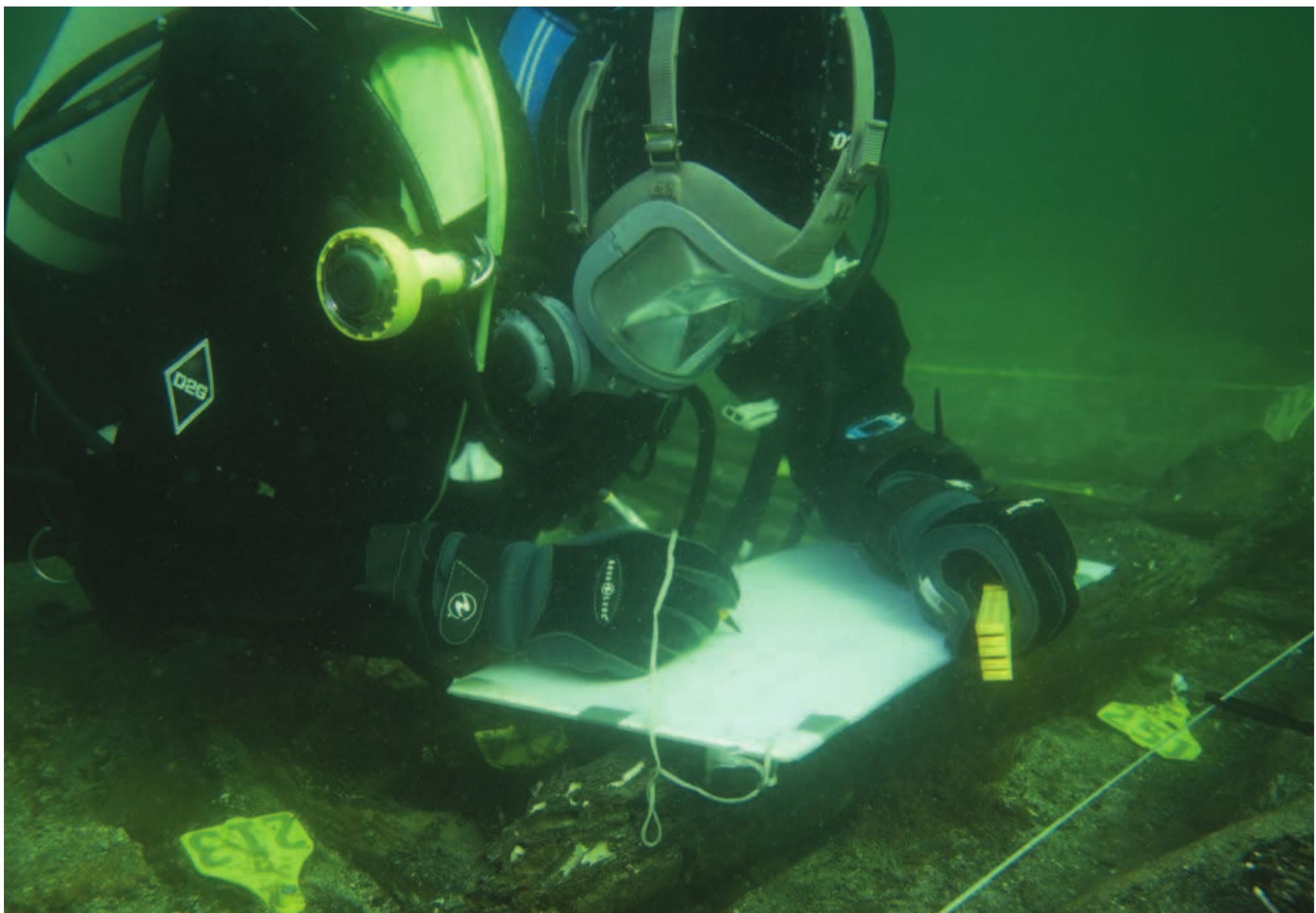 Diver recording an offset profile through the wreck. the