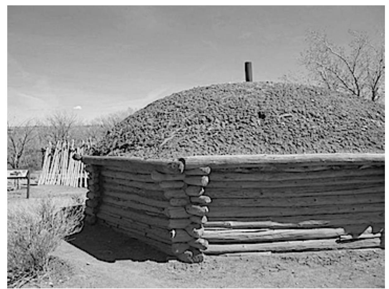 Modern log hogan figure 6. traditional adobe hogan