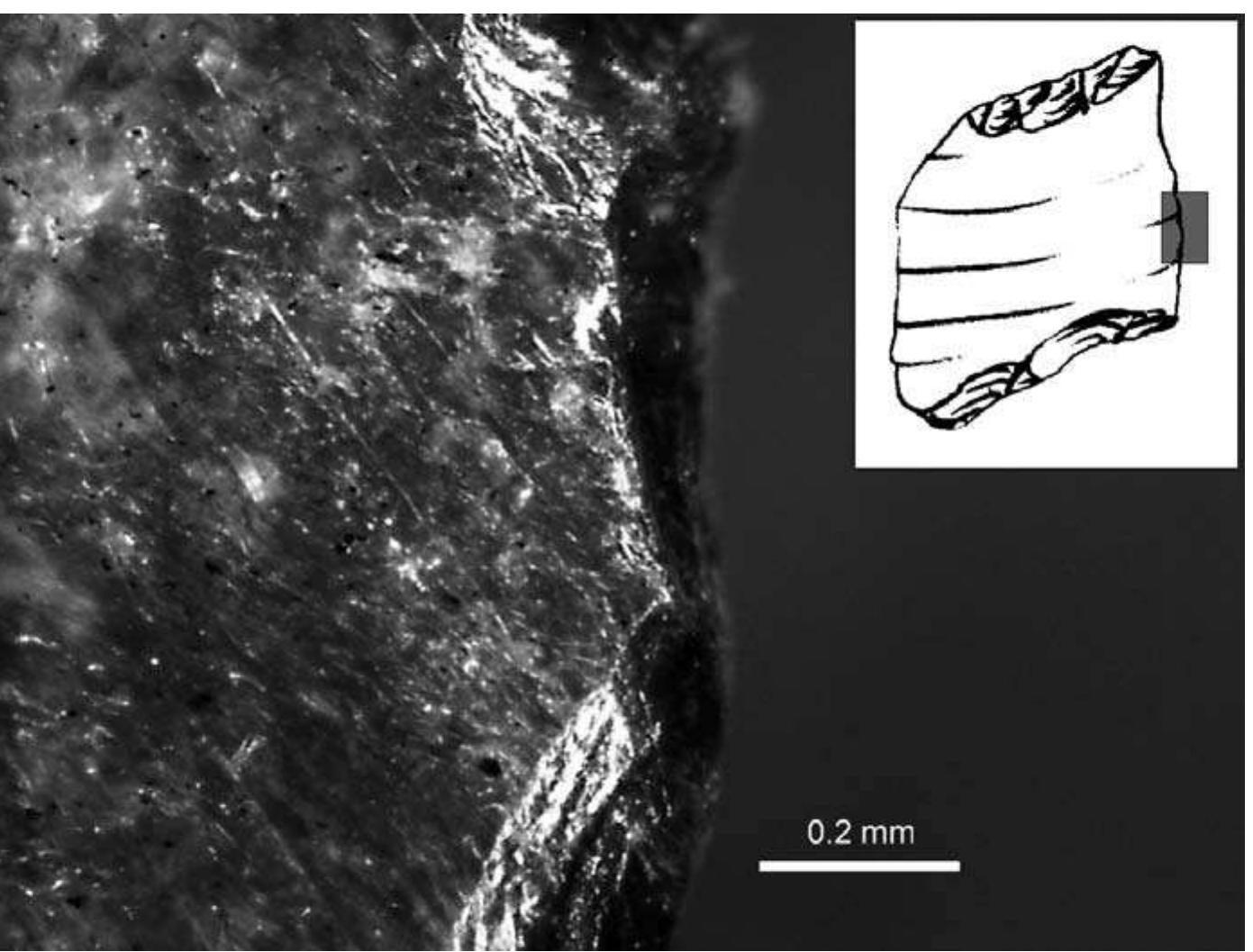 - use-wears on the edge of obsidian rhomboid from the upper