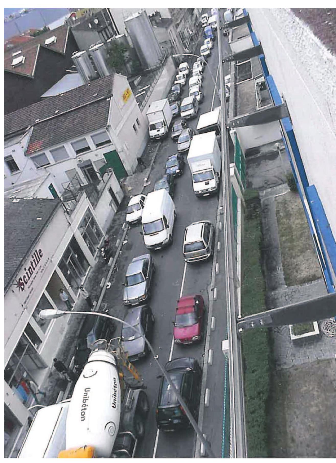 A typical traffic jam on the haie cog street. (scan of a