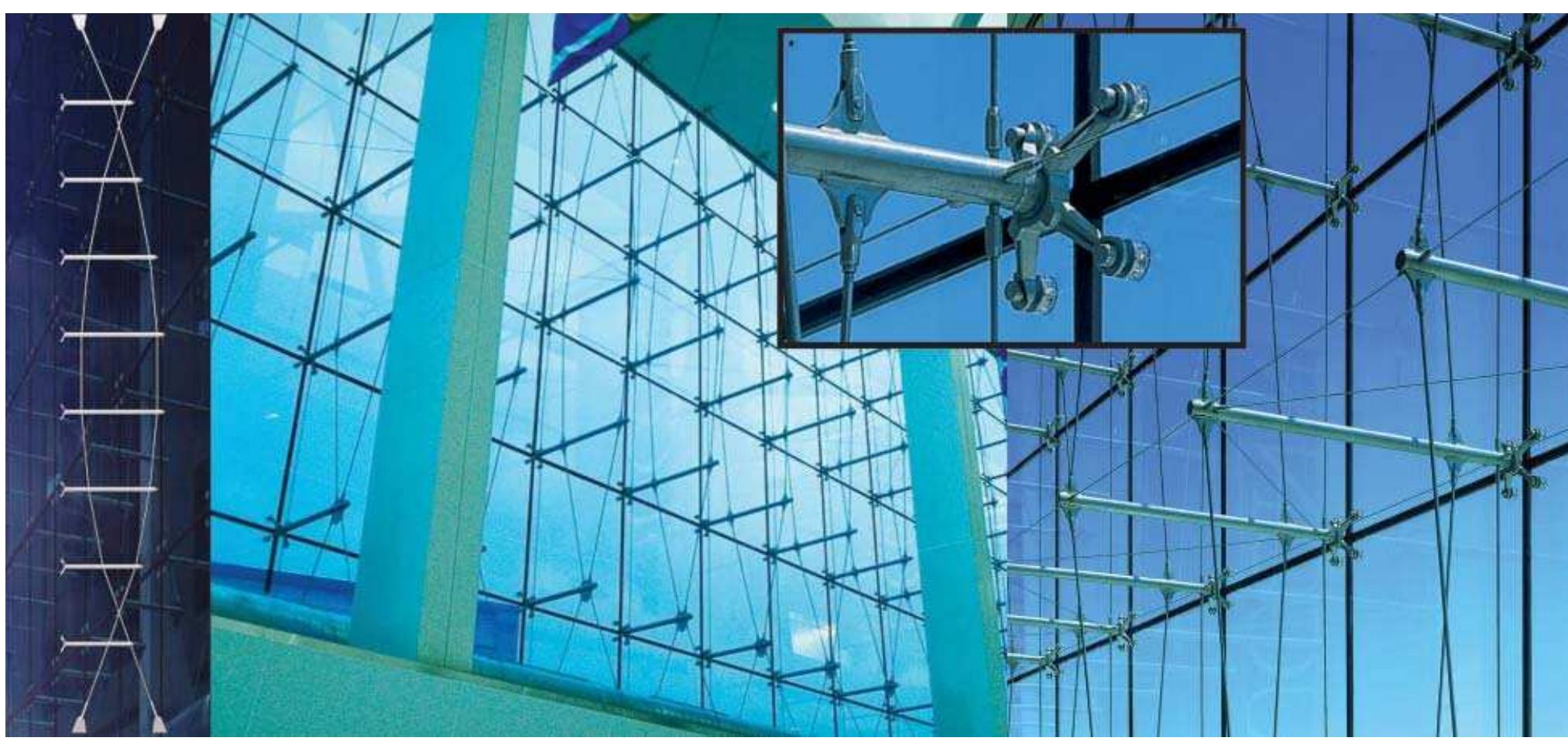 A series of inverted cable trusses define this glass facade.