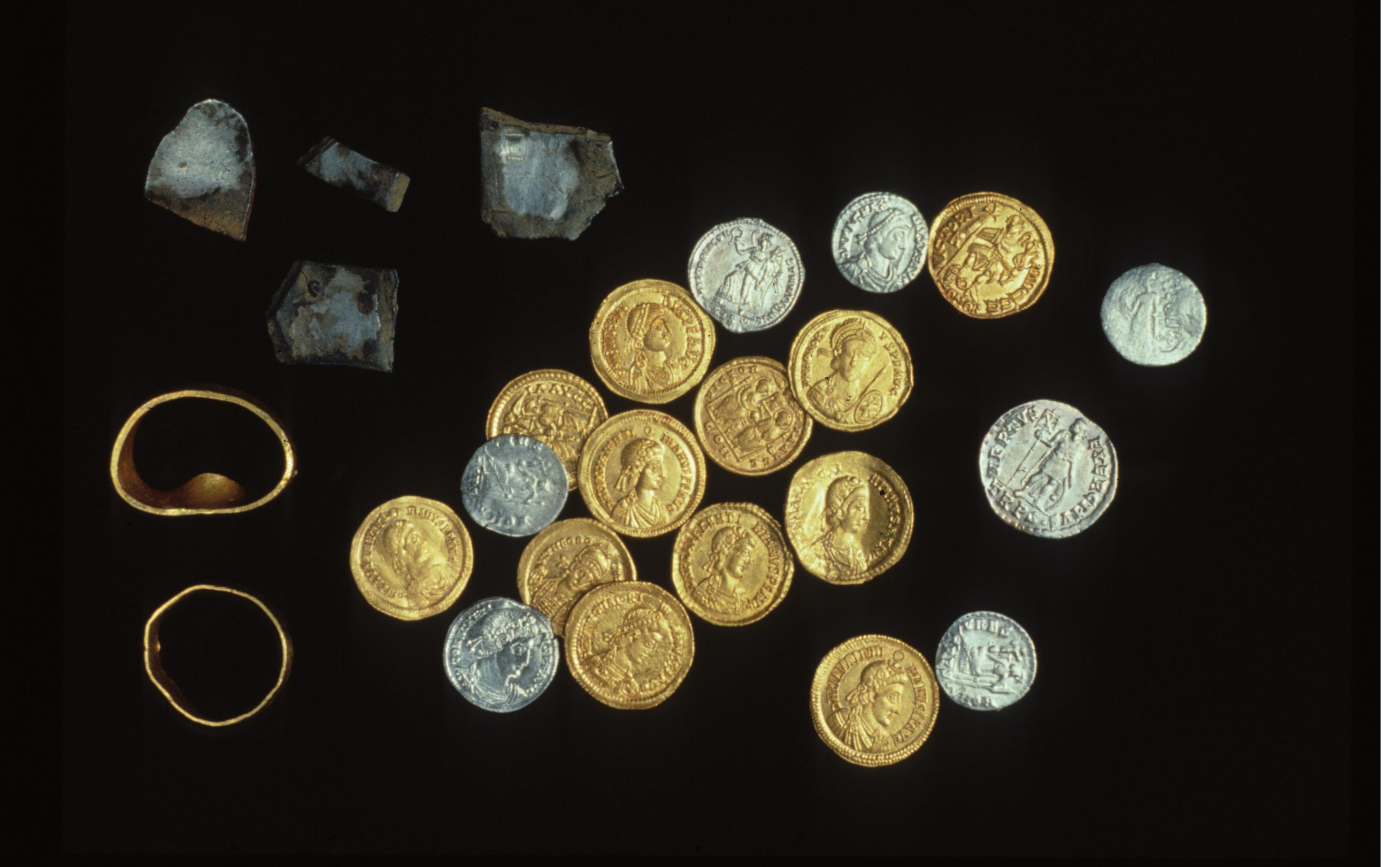 The patching hoard; group shot of the two gold rings and a
