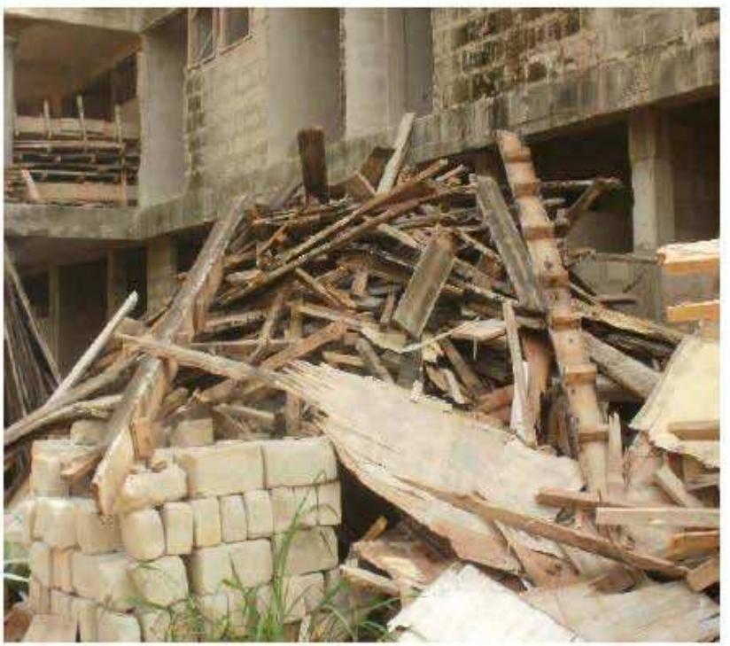 A) dismantled formwork boards b) dismantled formwork left on