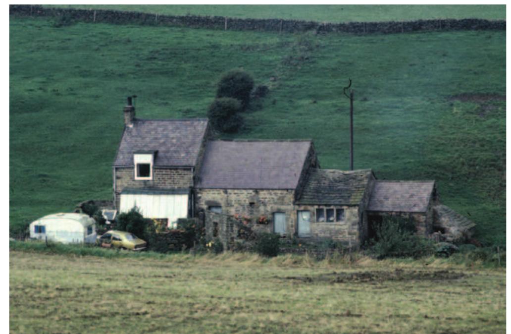 Farmhouse with attached smithy (second building from the