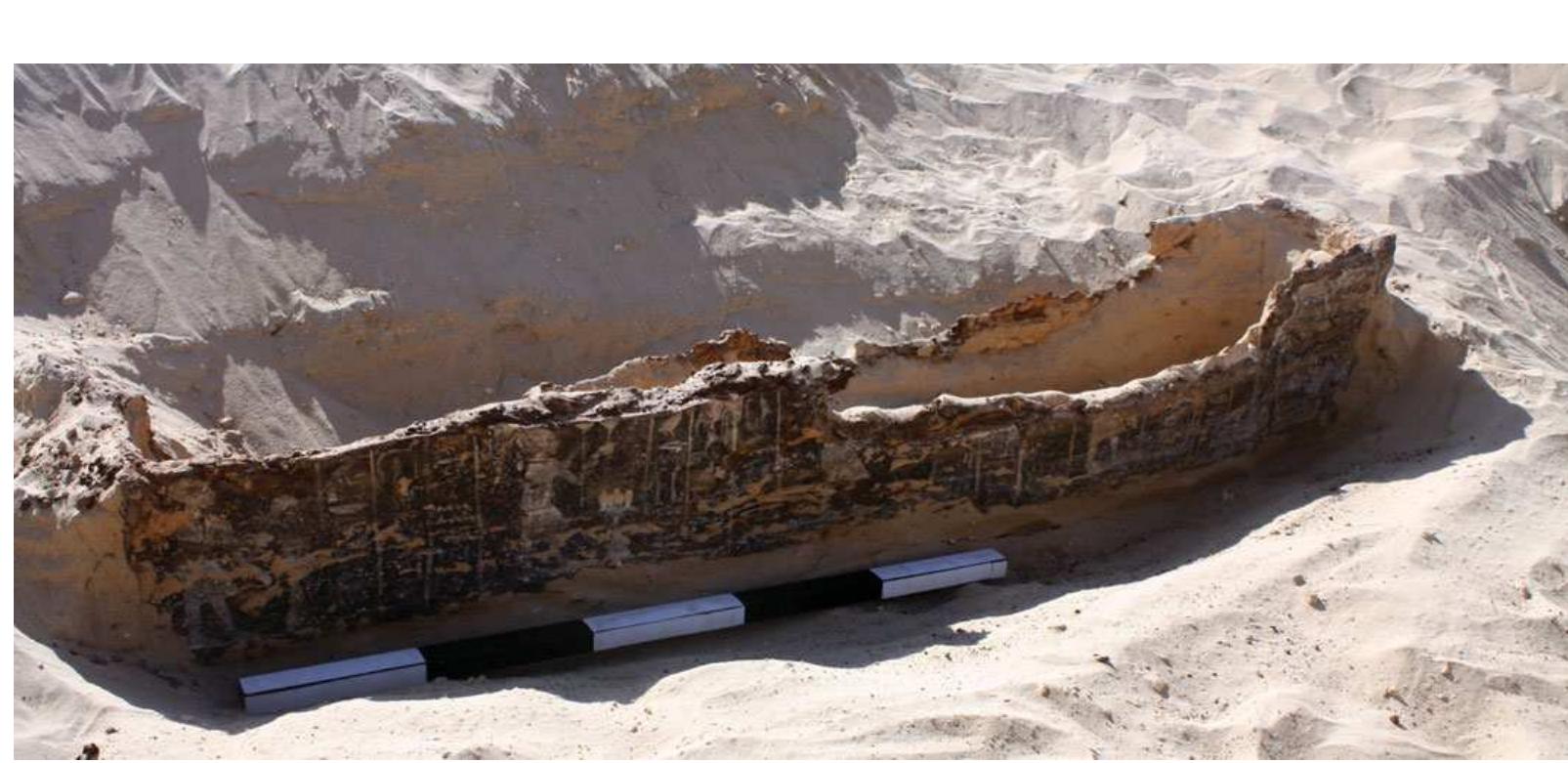An anthropoid wooden coffin excavated at the lower site