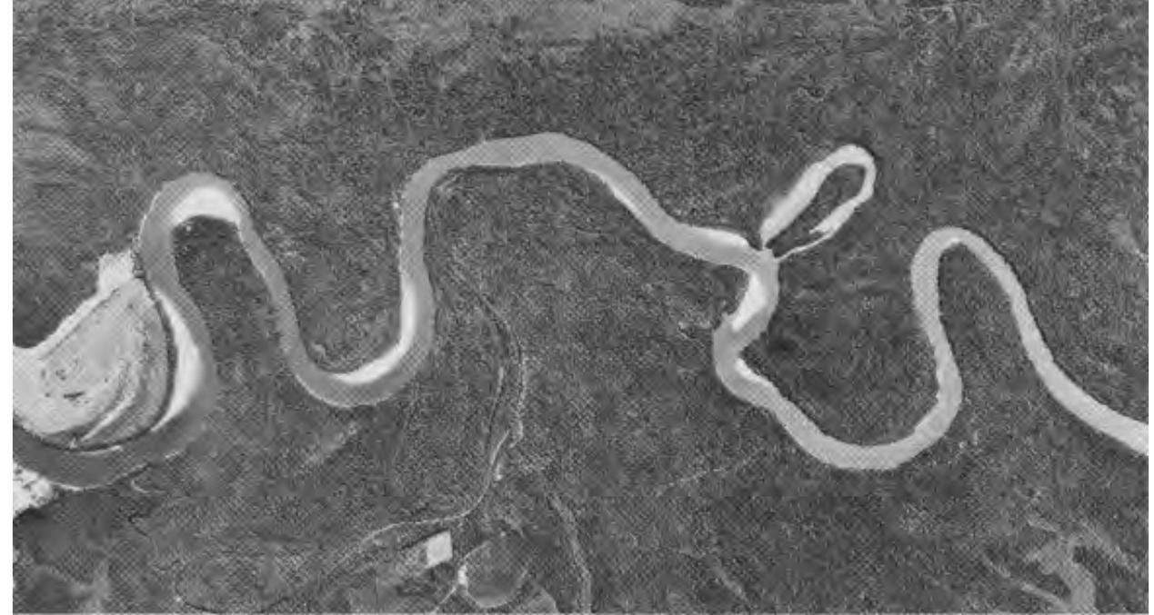 O-7 an areal photograph of a meandering stream with an