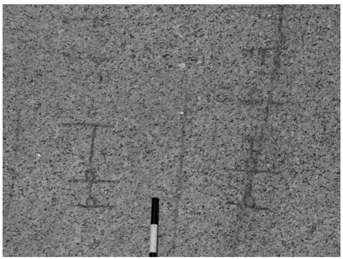 quarry marks of step —-work, scale in the photo is 20 cm.