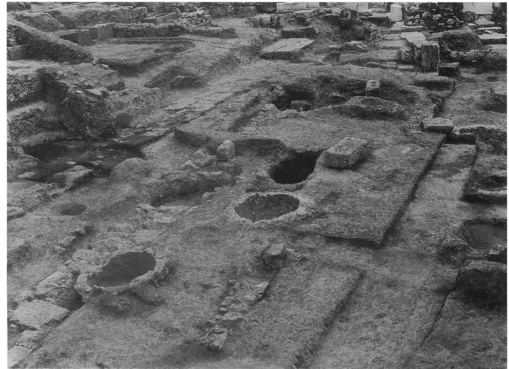 B. view of area in front of foundations for stoa, from east