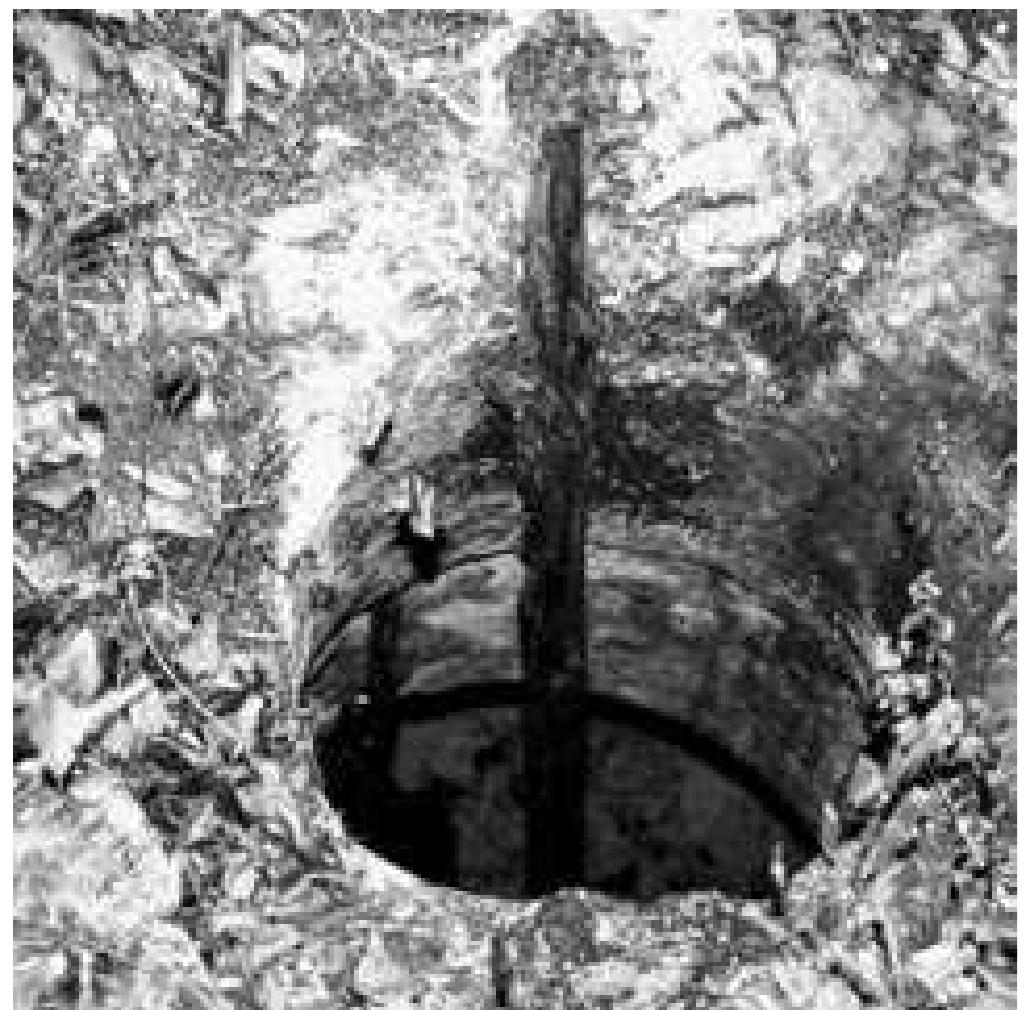 Xtablakal. chultun opening (photograph by karl herbert