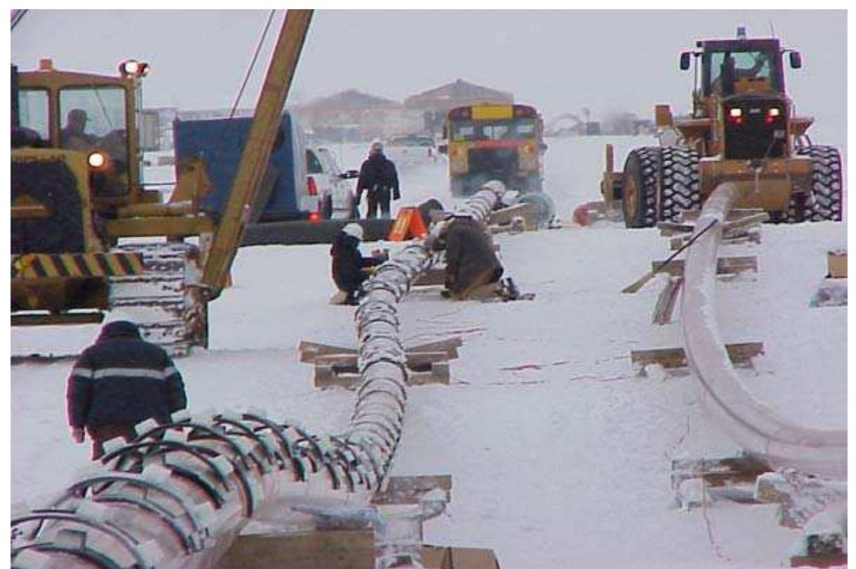 10 — installing casing insulators on product pipe prior to