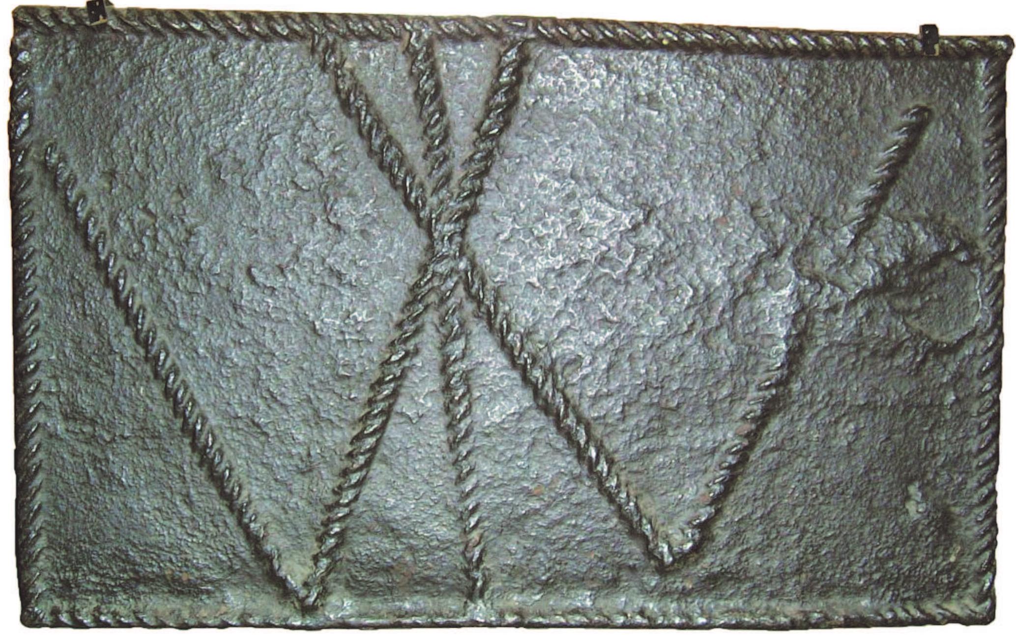 Figure 1 - Apotropaic Symbols on Cast-Iron Firebacks