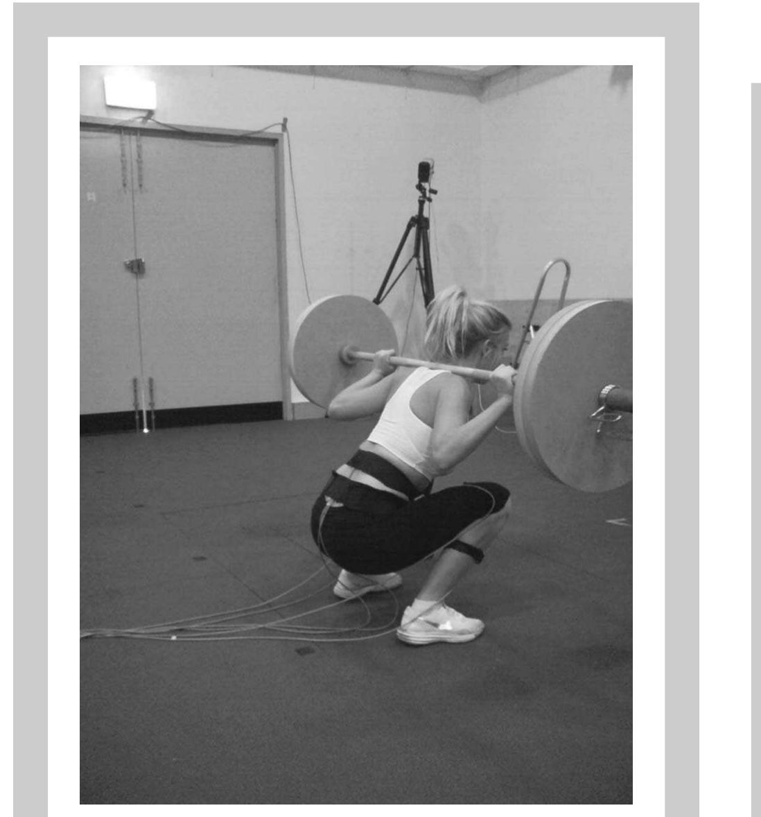 Digital picture of squat technique with sensors attached