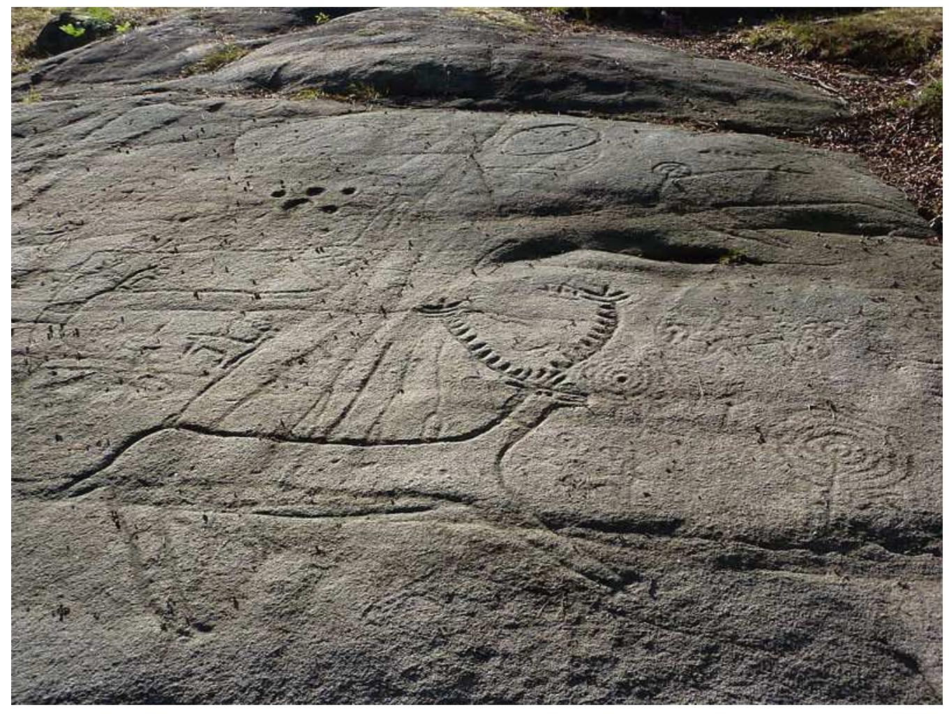 The following beautiful rock art featuring cup and ring