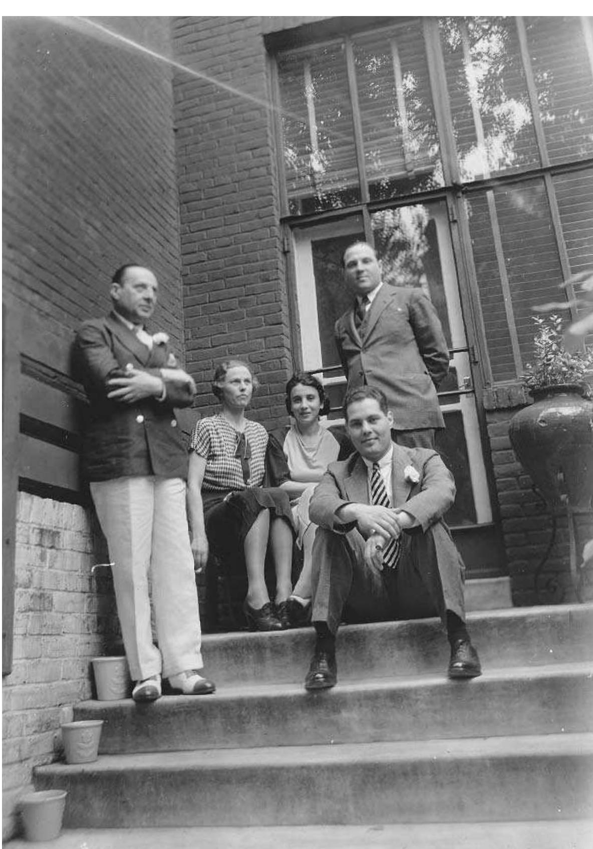 9.23. photograph of speiser family posing on the garden