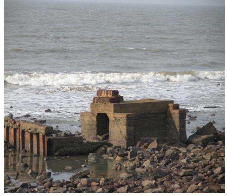 An eroded remnant of a structure in old digha beach the