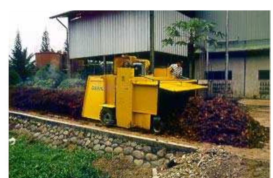 Figure 6 - COMPOSTING OF EMPTY OIL PALM FRUIT BUNCH (EFB)