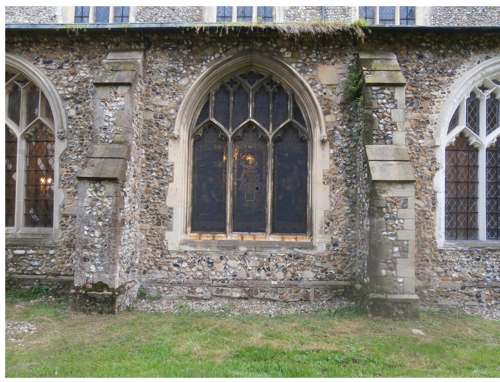 Plate v: north aisle wall showing c13 chamfered plinth