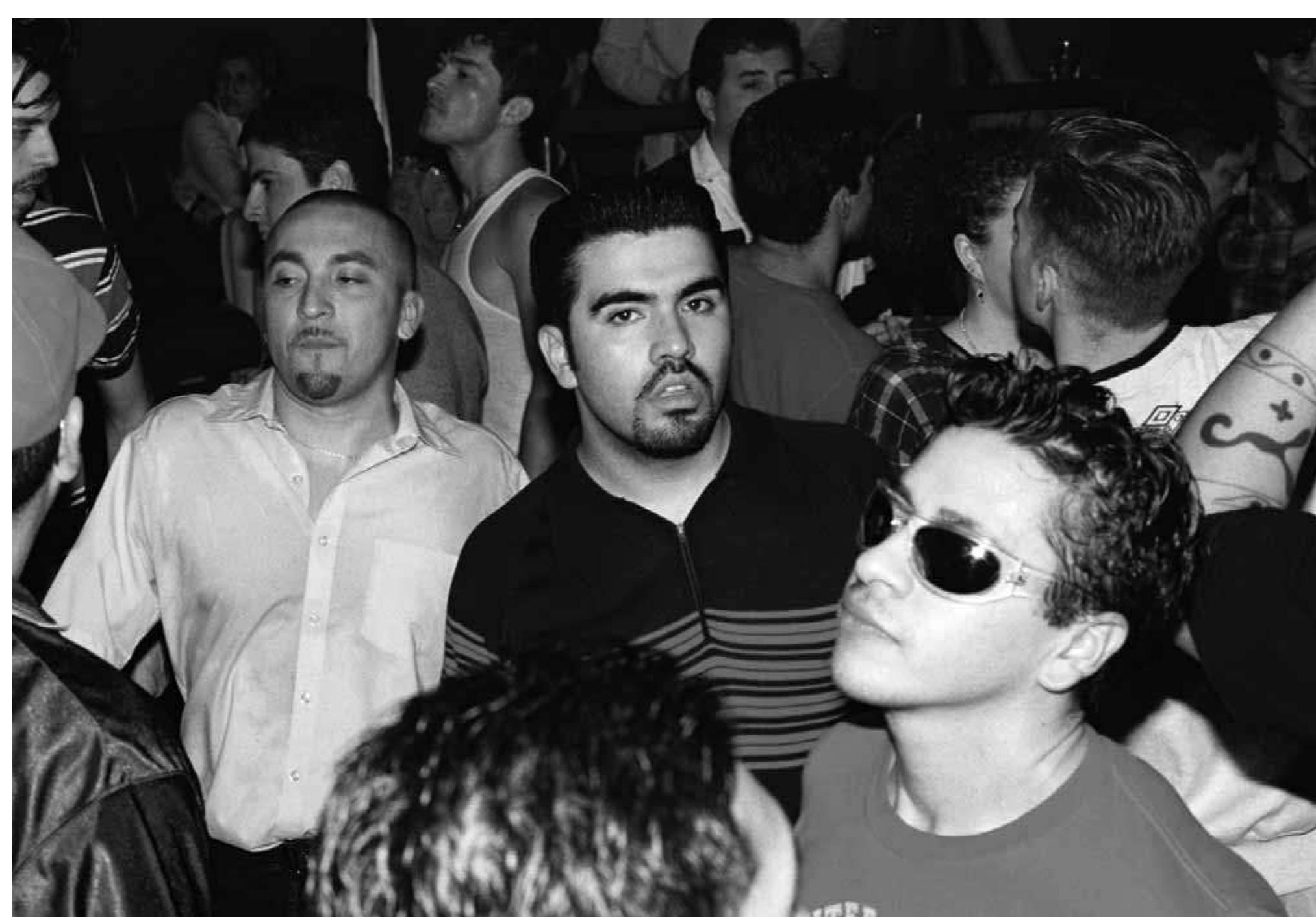 Crowd dancing on a busy night at pan dulce. those attending