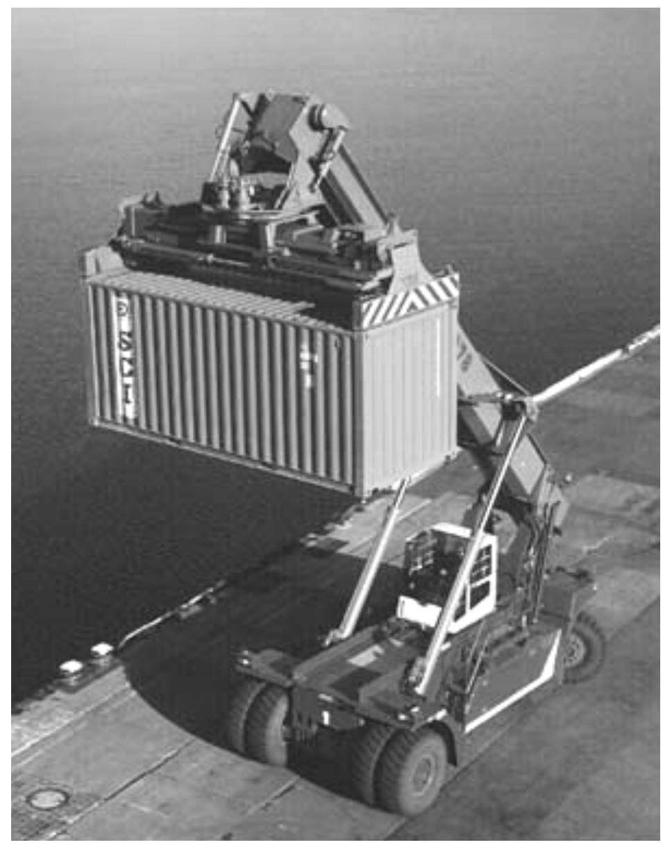 -7 typical reach-stacker fel with spreader at 20 figure 2-6