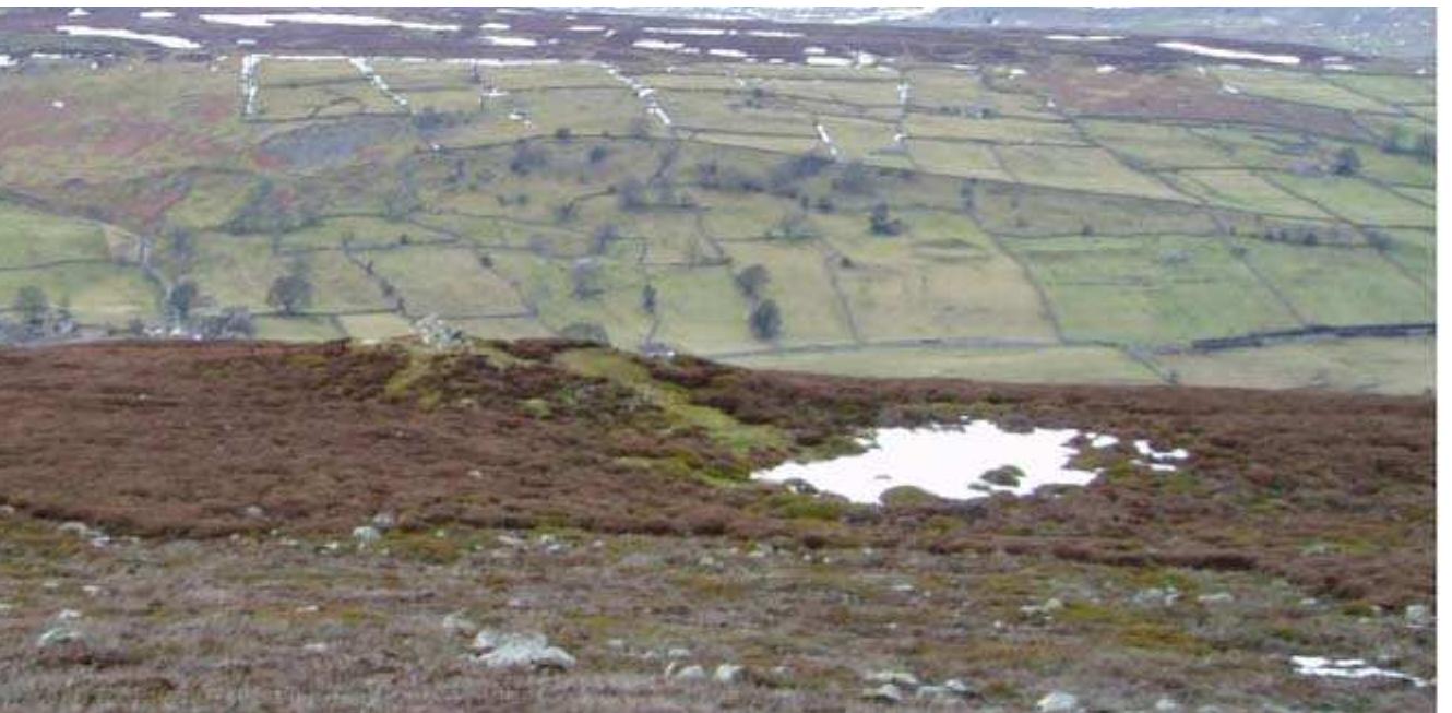Dudderhouse hill long cairn on its raised limestone plateau