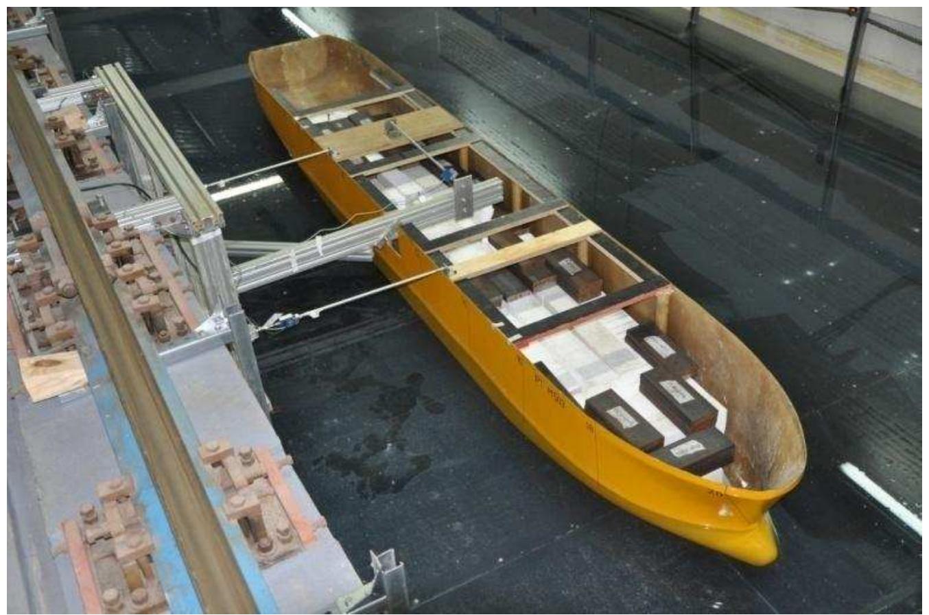 The moored ship model was attached to a frame using