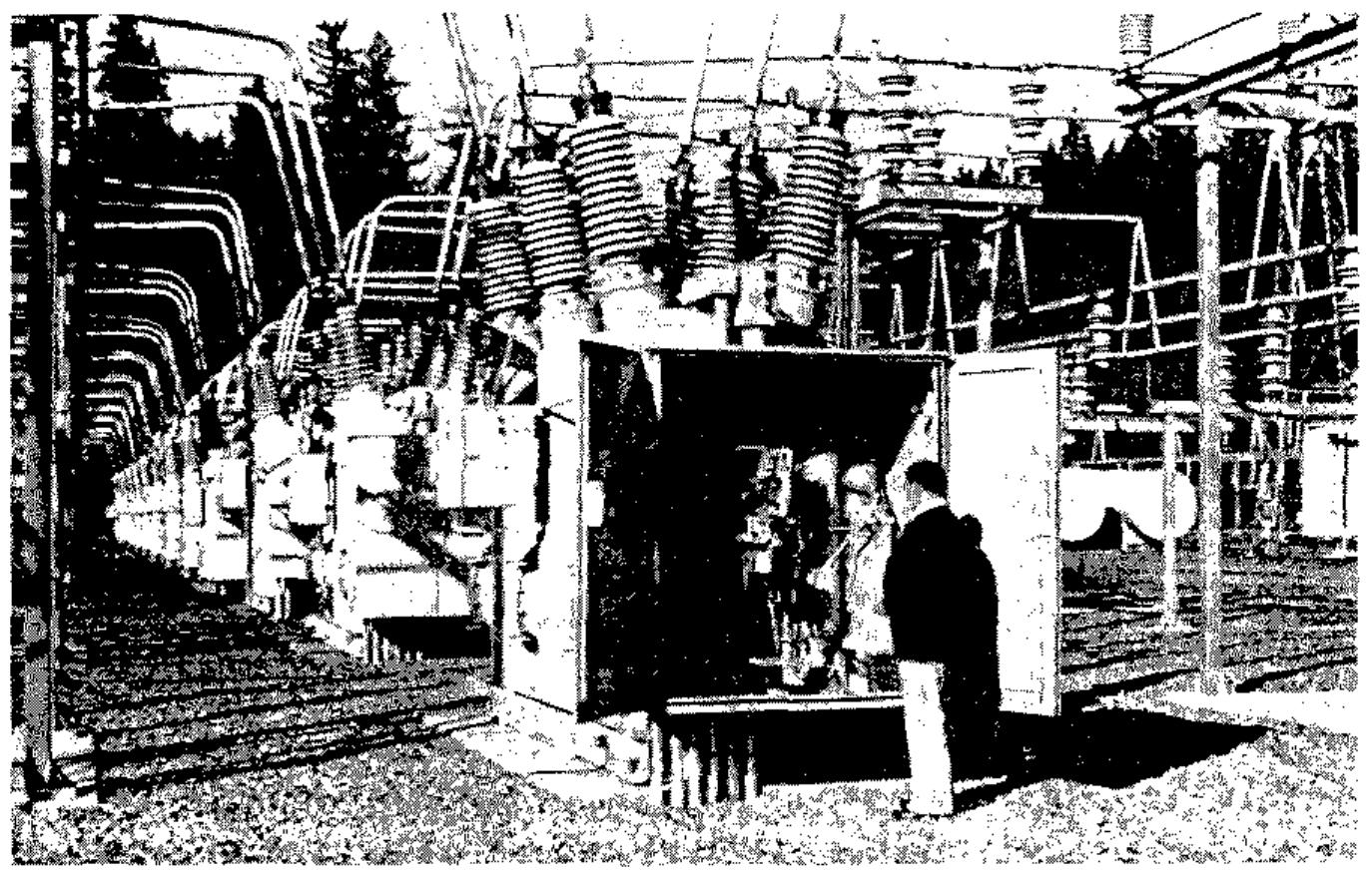 7. rowof typical three-phase 115-kv oil circuit breakers.