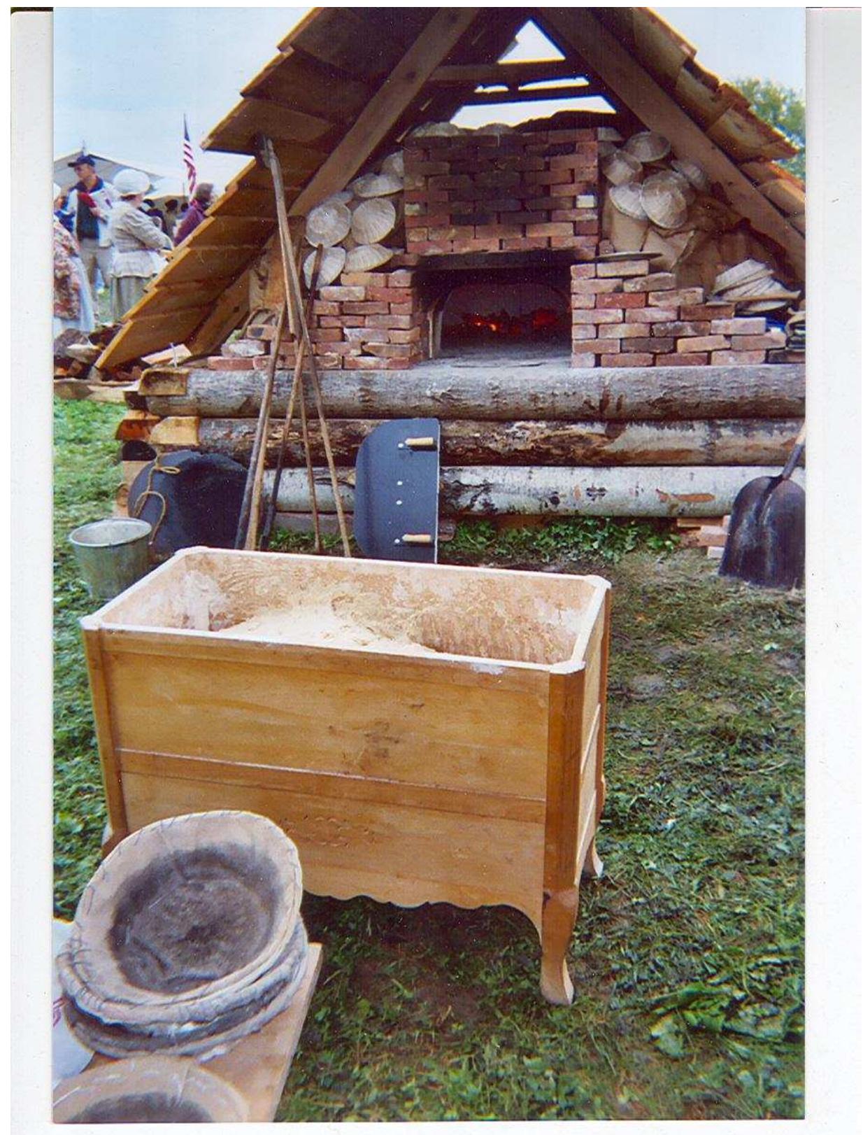 Front view of saratoga oven, with mixing trough and other