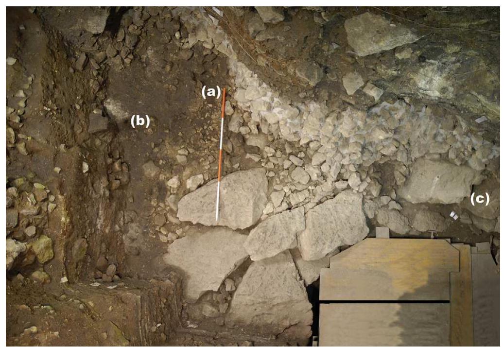 Following the funerary units, a sequence of prepared floors