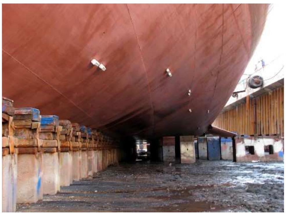 23: sacrificial anodes on a ship’s hull.