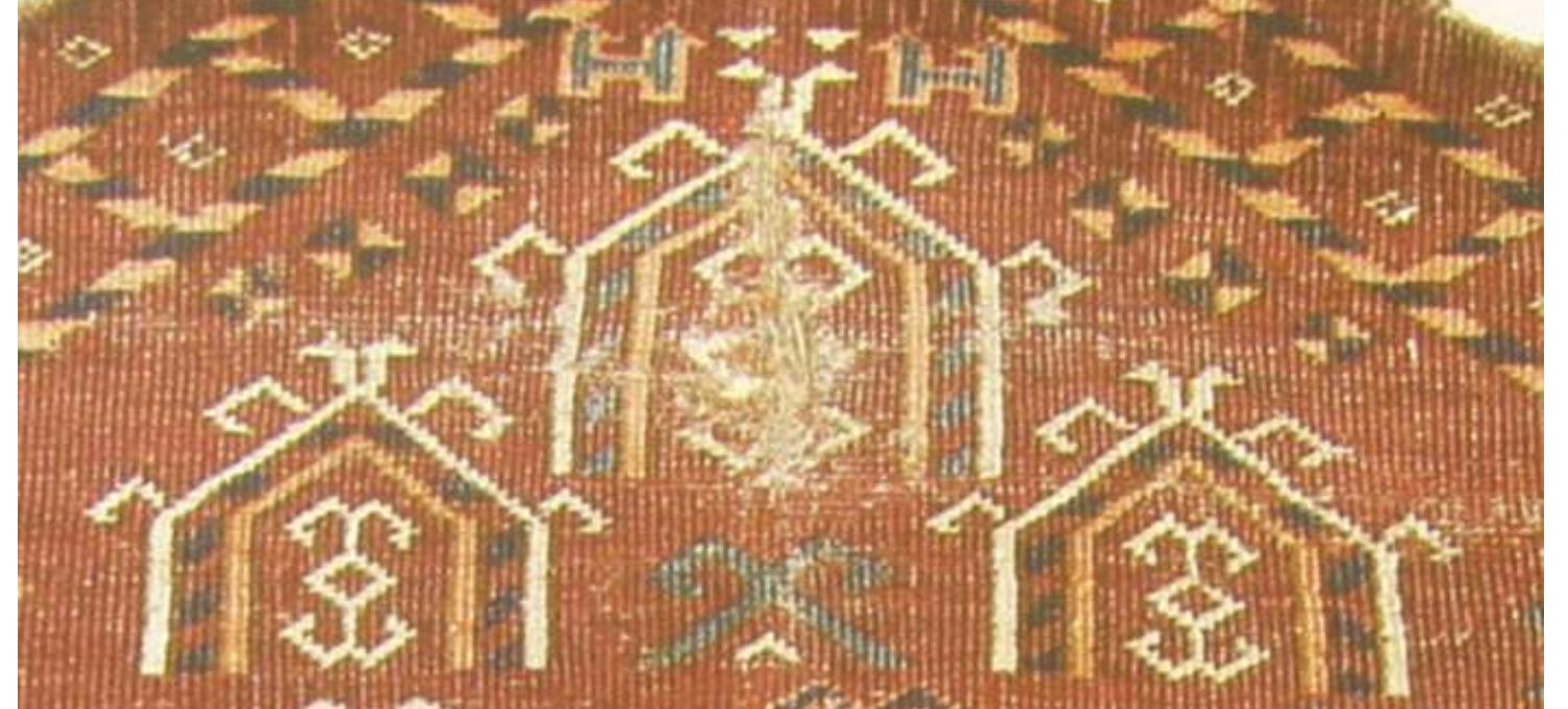 Detail showing the unusual ‘triple niche” iconography which