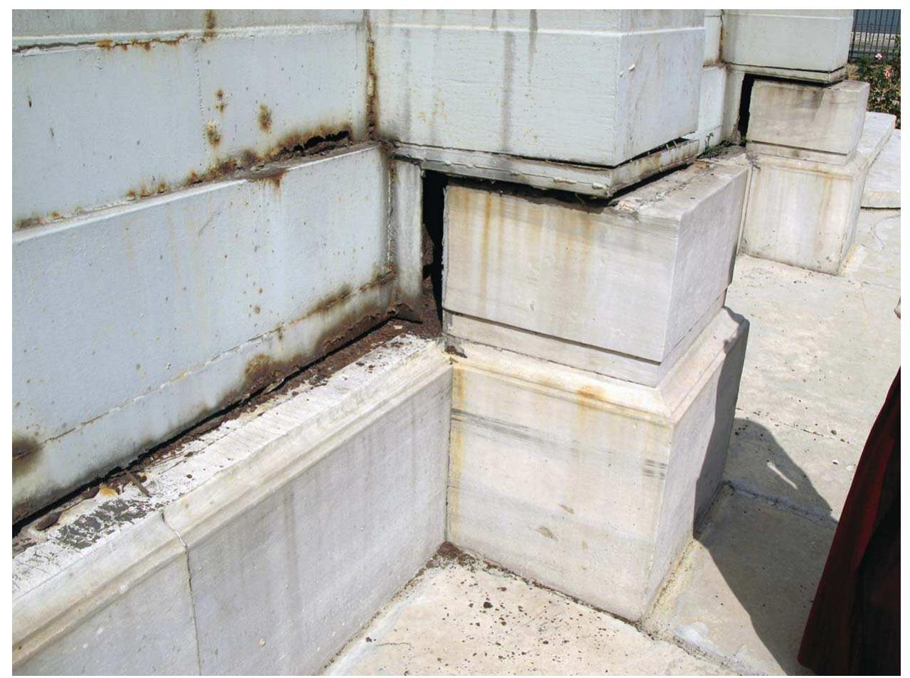 Photograph of the subsided and tilted footing blocks with