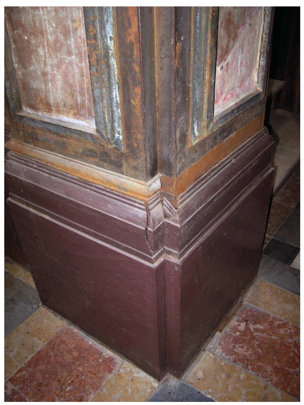 Photograph of the damaged cast iron cladding in the interior
