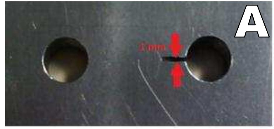 Depicts the sample plate where two machined holes and a