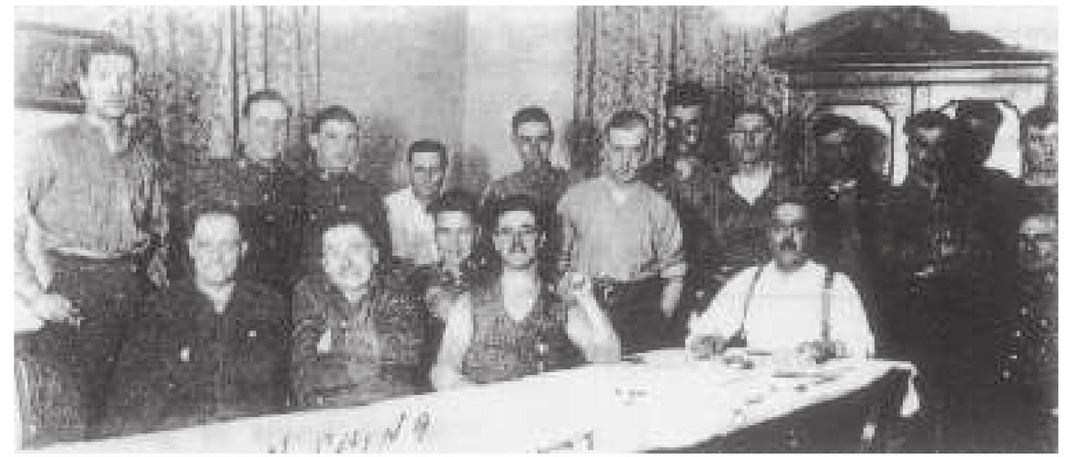 Ernest frank catchpole (extreme left) at a christmas dinner