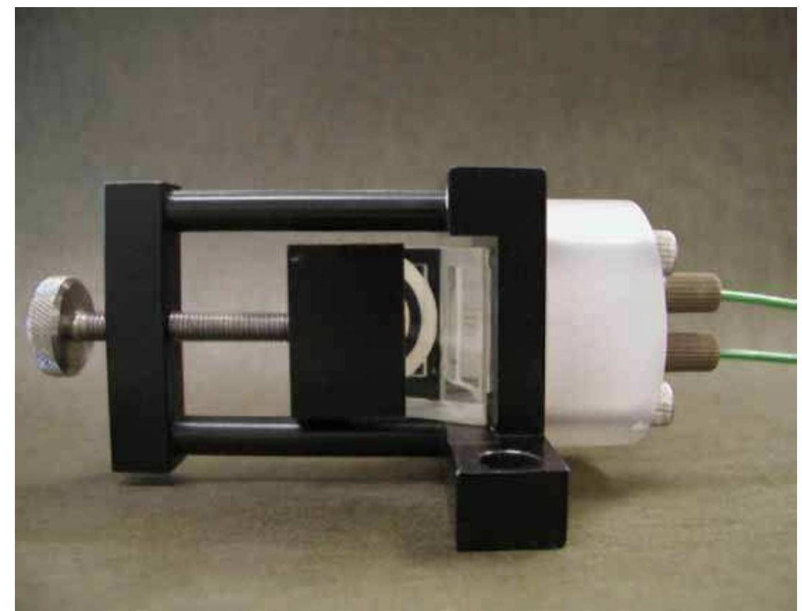 Fully assembled sample holder/flow cell assembly.