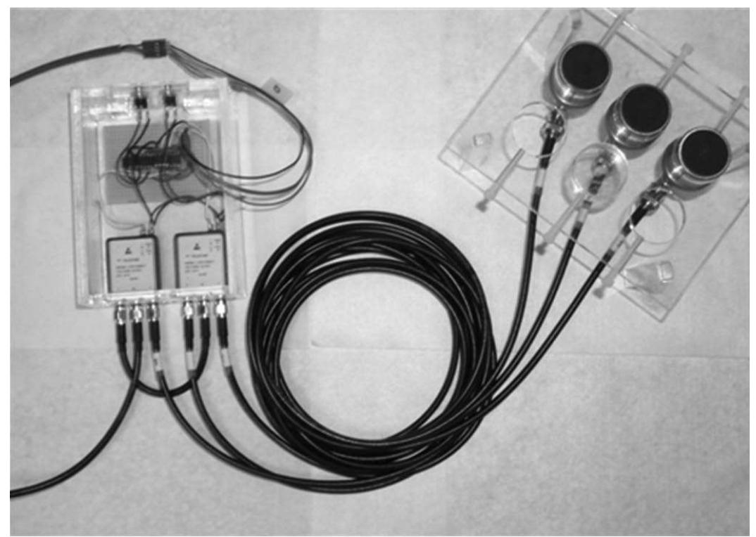 Relay circuit and transducer stand with three transducers.