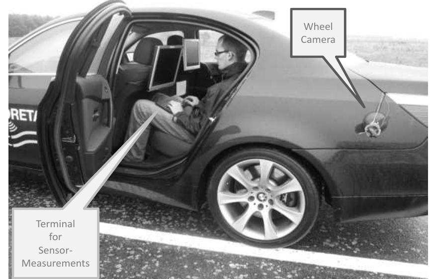 Test car with terminal for recording sensor measurements.